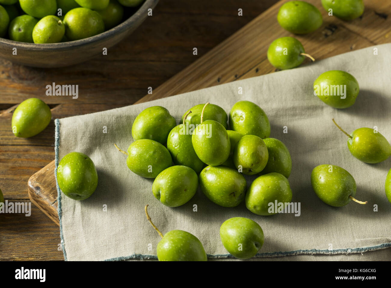 Raw Green Organic Fresh Olives Ready to Cook Stock Photo - Alamy