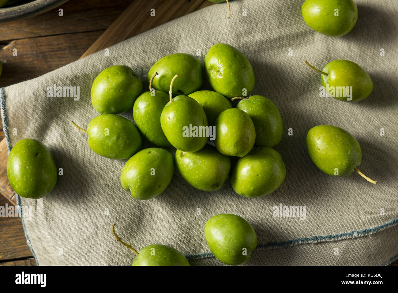 Raw Green Organic Fresh Olives Ready to Cook Stock Photo - Alamy