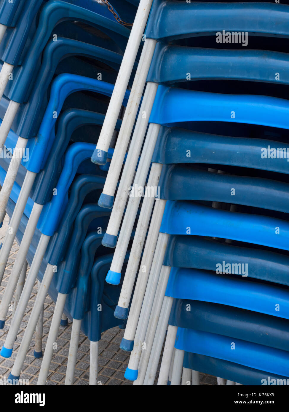 Stacking plastic chairs hi-res stock photography and images - Alamy