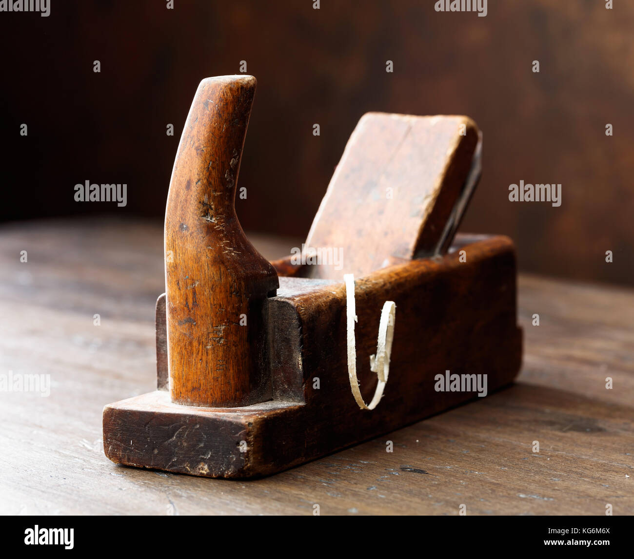 Old wooden planer on the table in the workshop Stock Photo - Alamy