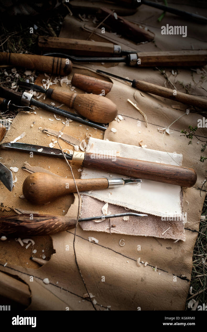 old wood carving tools background Stock Photo - Alamy