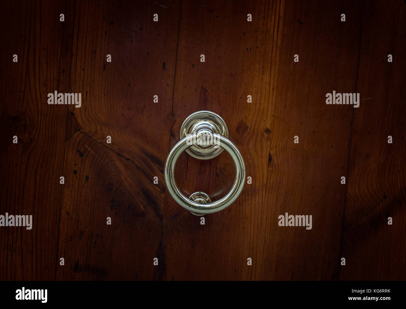 Old metal door knocker closeup background Stock Photo - Alamy