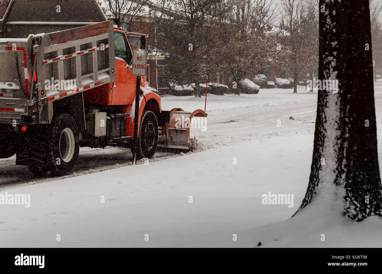 city street covered with snow during heavy winter storm in one capital ...