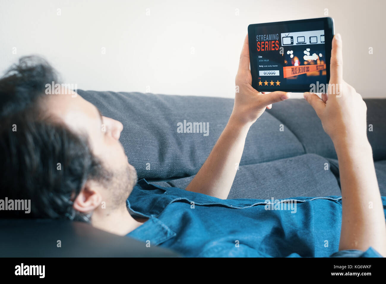 Watching tv series hi-res stock photography and images - Alamy