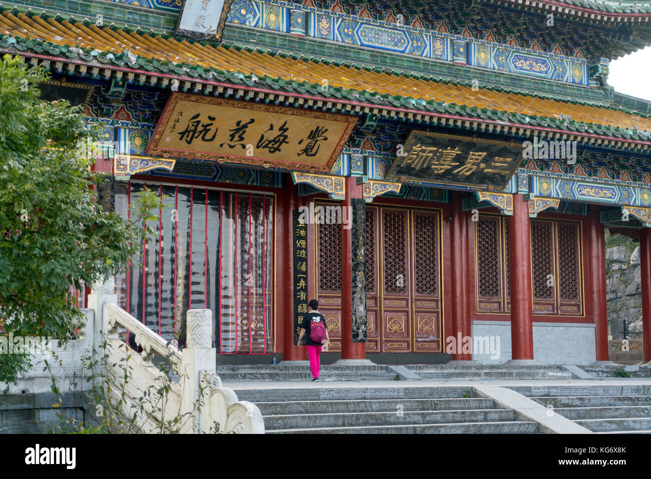 A woman walking in Tianmenshan temple in Hunan Province, China Stock ...
