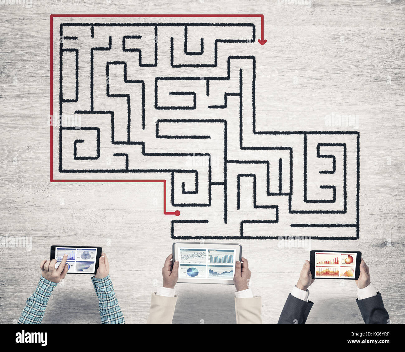 Group of people with devices in hands working together to find right ...