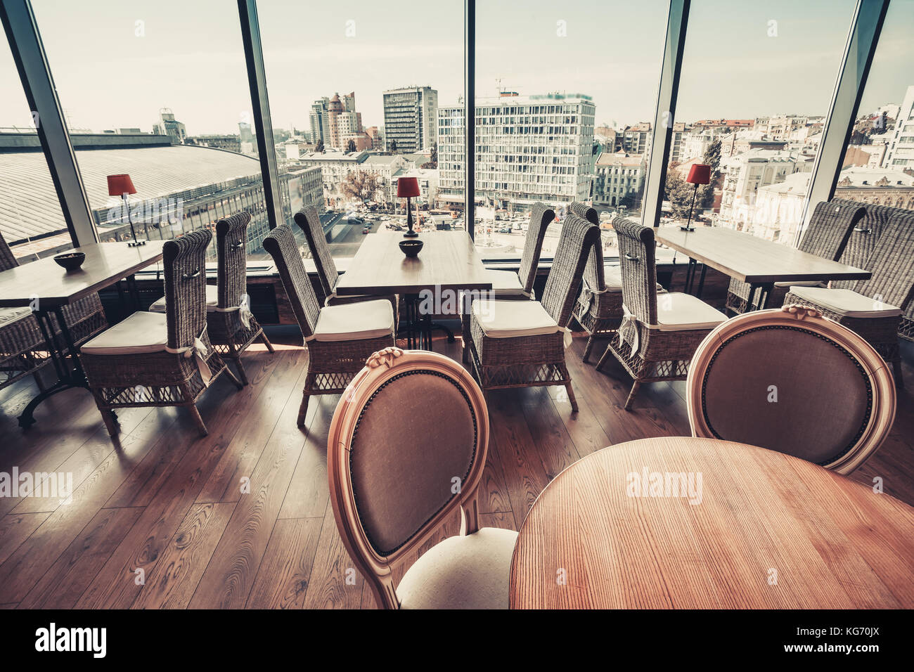 Modern simple cafe interior with wooden furniture Stock Photo - Alamy