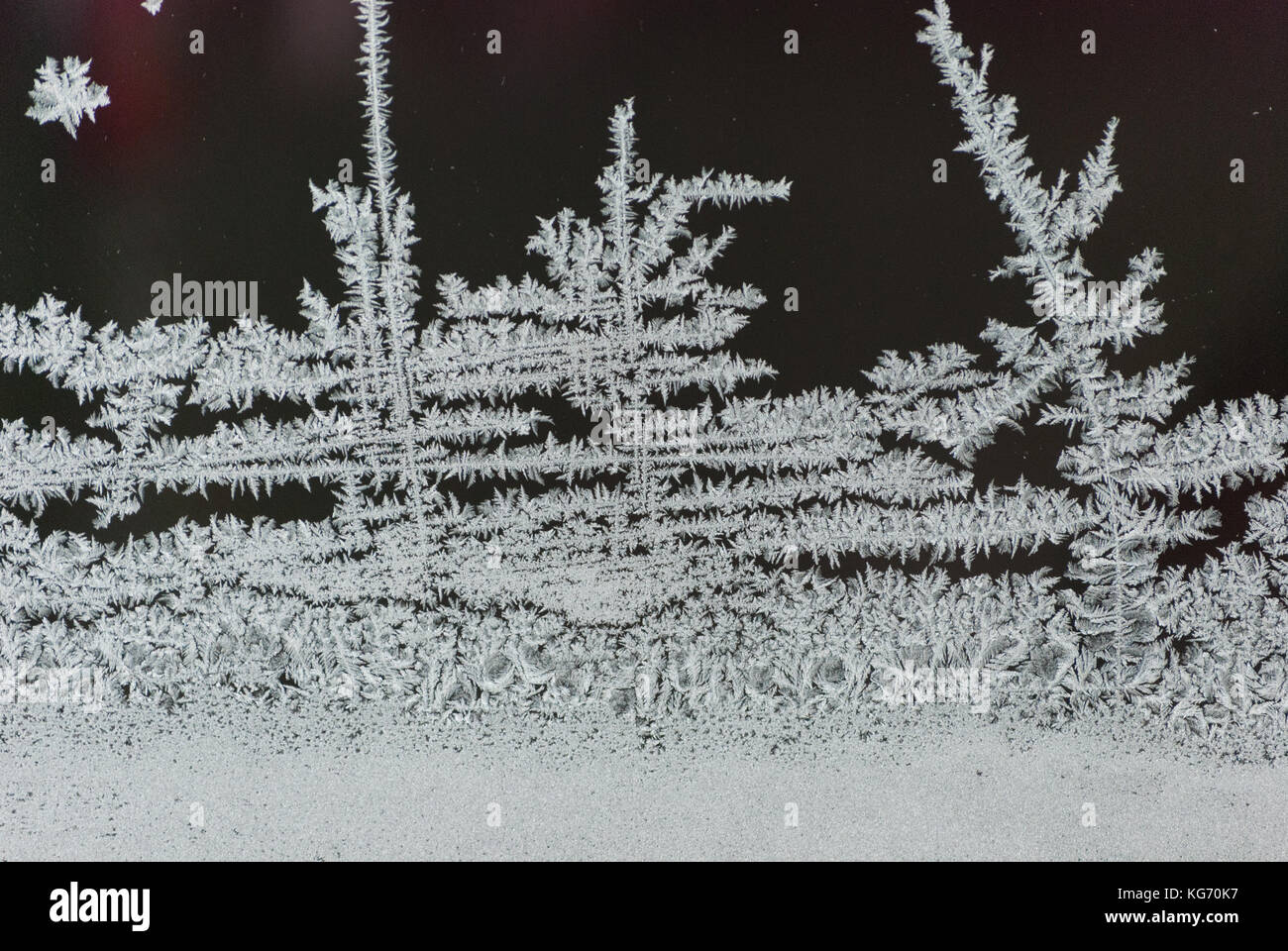 frosty patterns in the window Stock Photo - Alamy