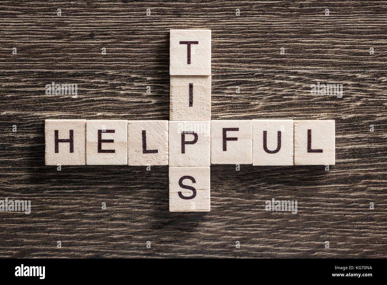 Words of business concepts collected in crossword with wooden cubes ...