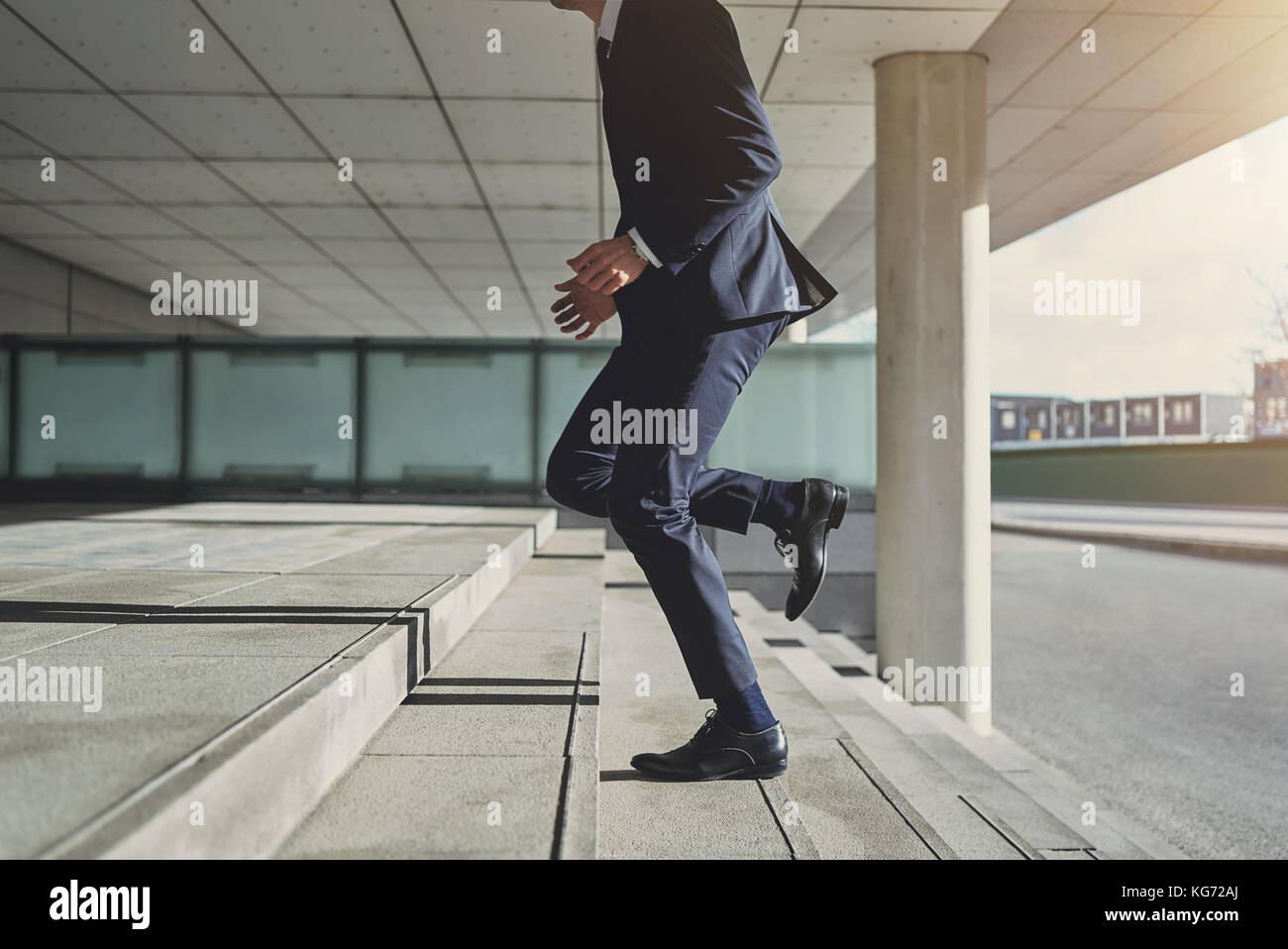 Runner businessman hurrying to office. Horizontal outdoors shot Stock ...