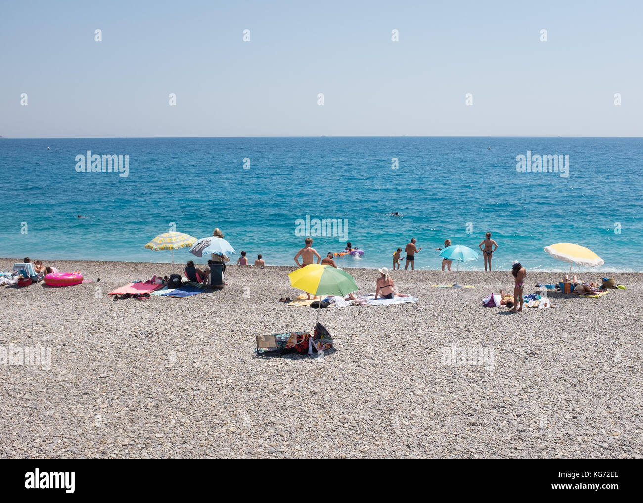 Male sunbathing on beach hi-res stock photography and images - Alamy