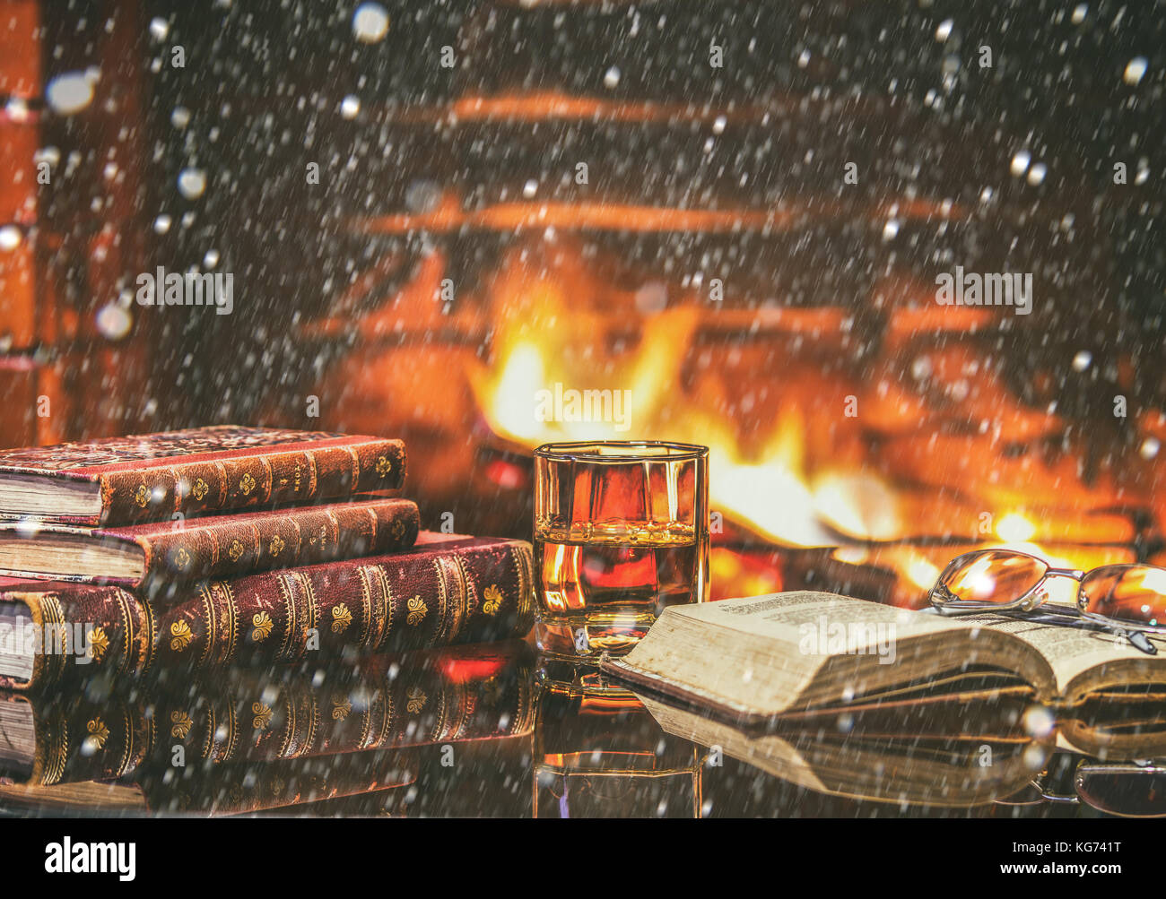 Fire fireplace reading cozy wine hi-res stock photography and images ...
