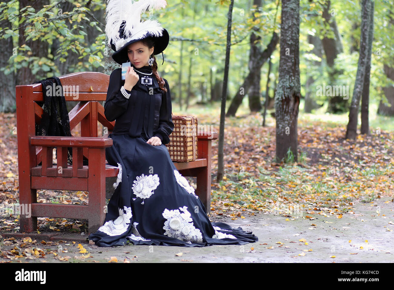 Pretty attractive girl in vintage clothes for a walk in the big ...