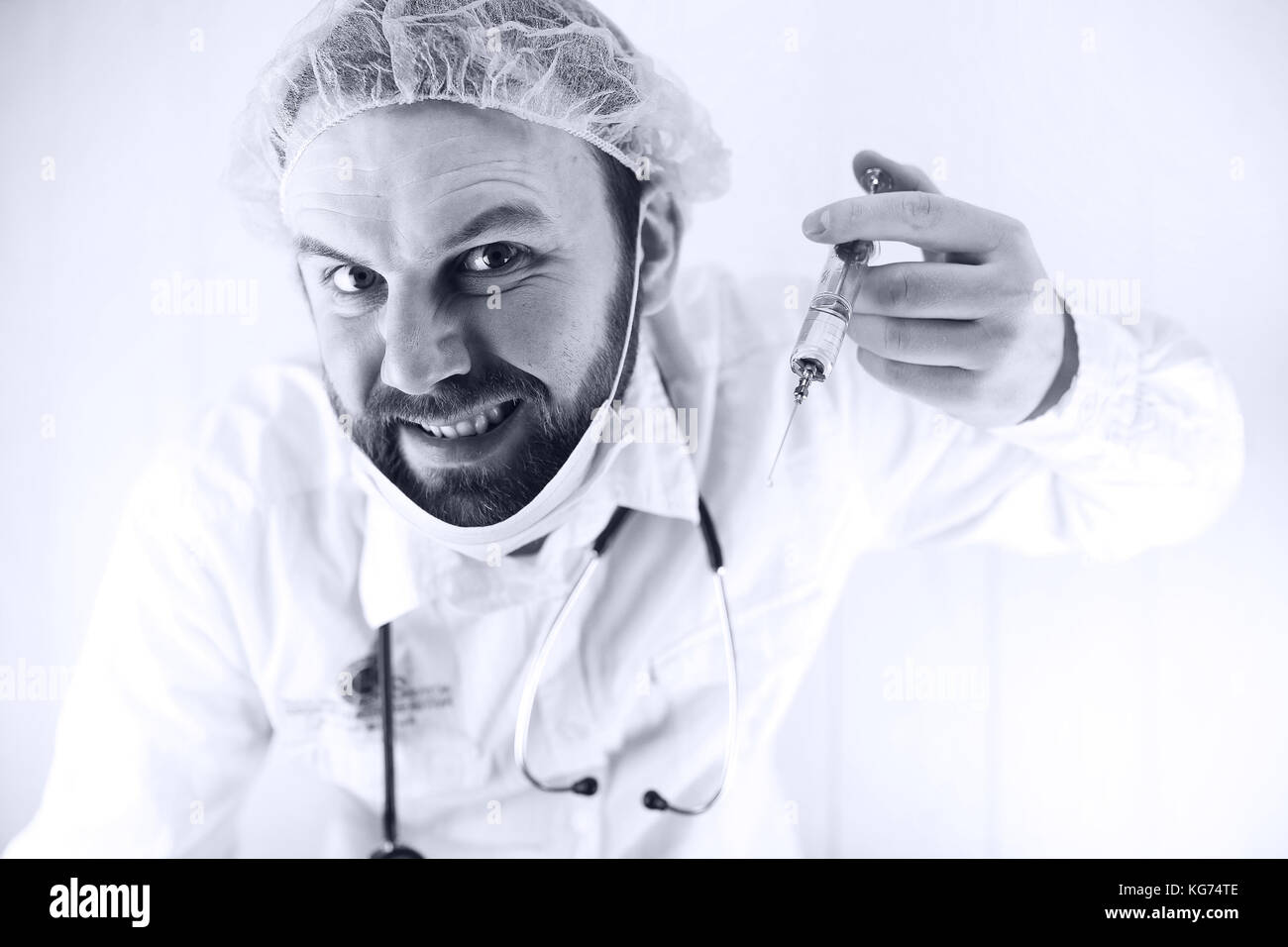 Black and white photo of bearded doctor in a white coat and an old ...