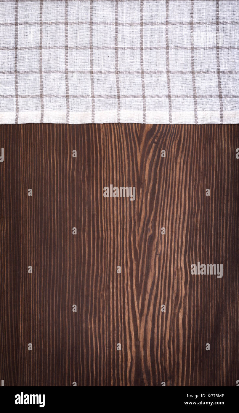Checkered Tablecloth On The Wooden Background Stock Photo - Alamy