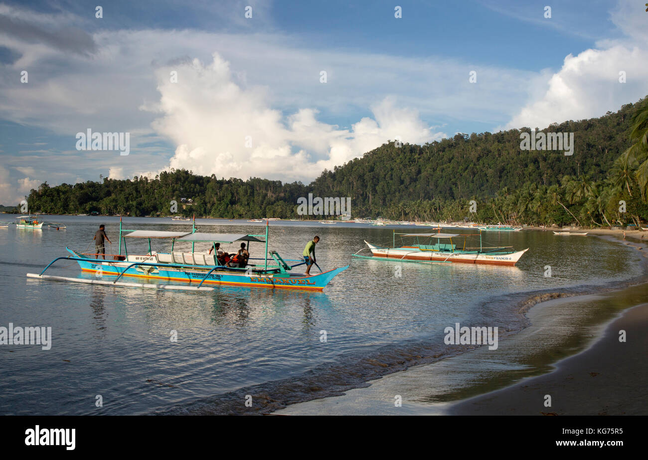 Port Barton beach with outrigger island hopping boats, Palawan ...
