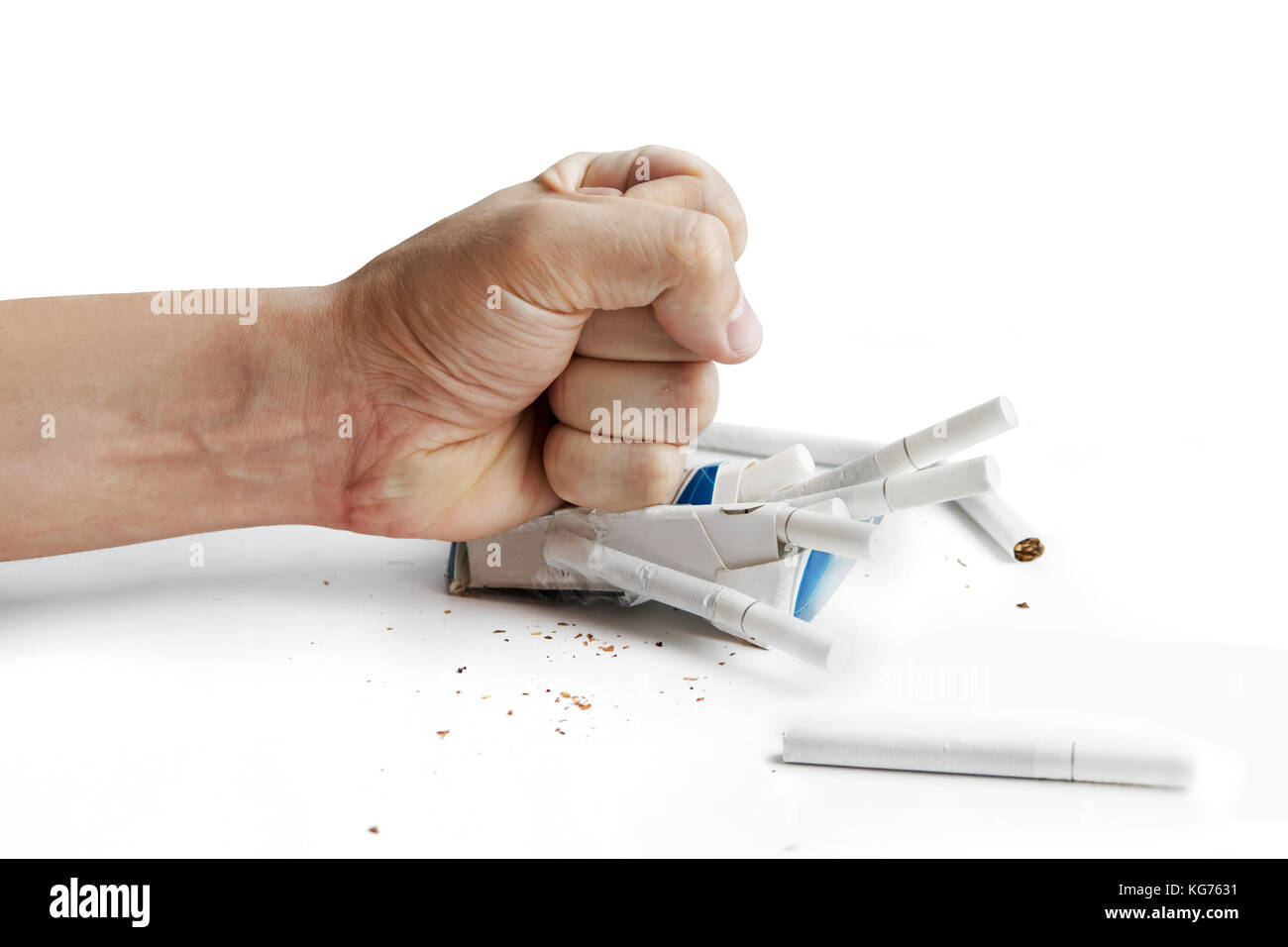 Man's fist crushing cigarettes isolated on white background Stock Photo ...
