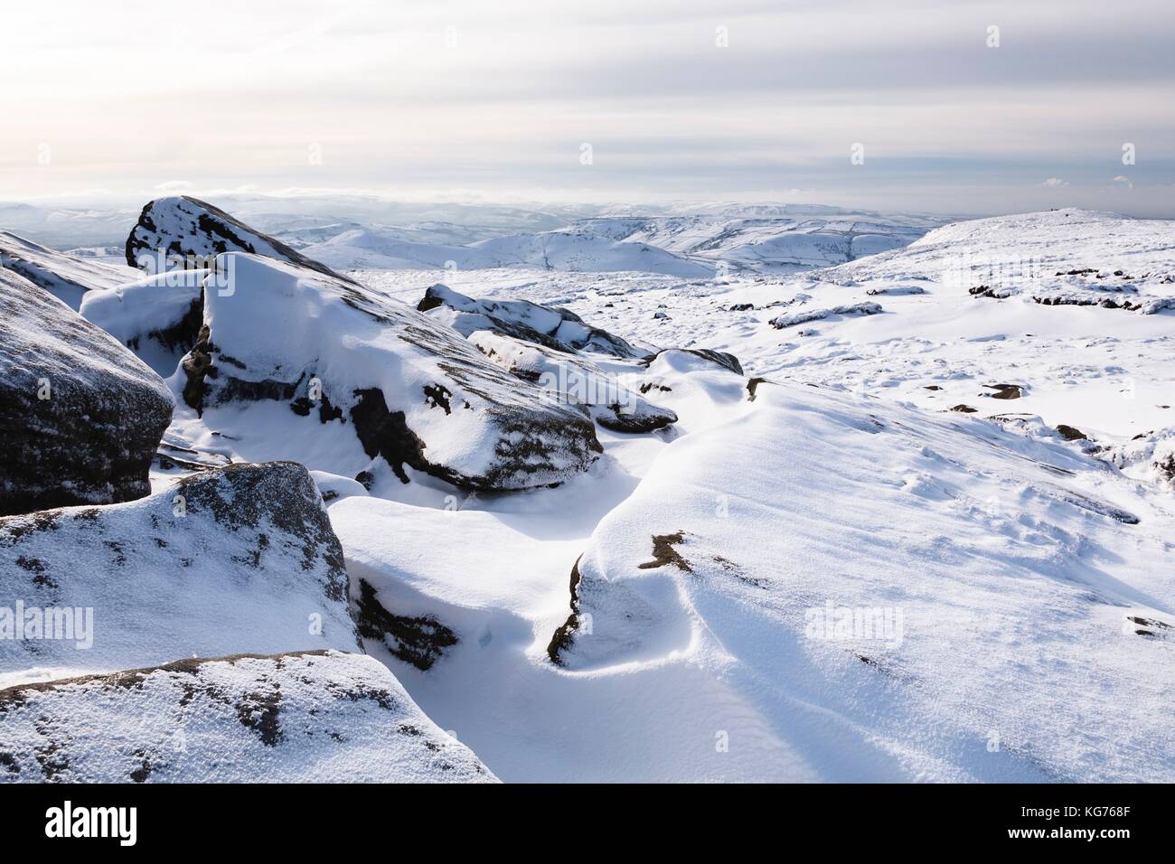 Snow covered tor landscape in winter, Kinder Scout, Derbyshire, England ...