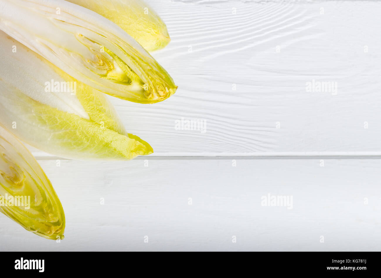 belgian witloof isolated on a white background Stock Photo - Alamy