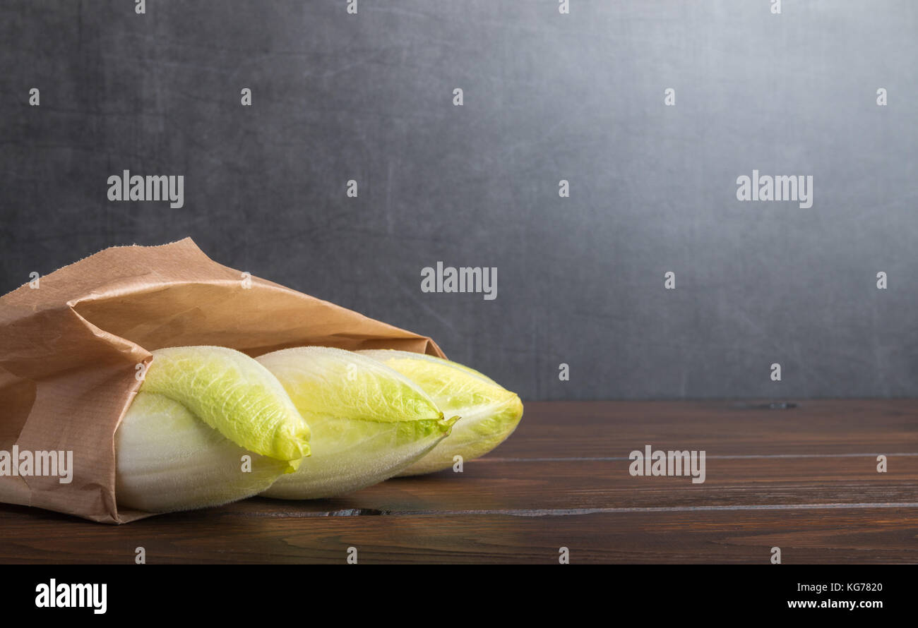 belgian endives close up in a bag front view Stock Photo - Alamy