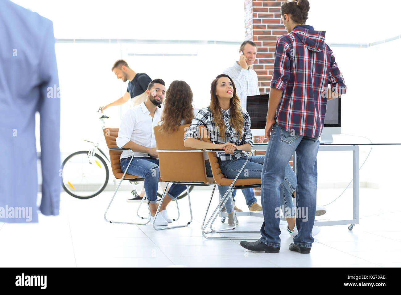 employees of modeling agencies on the workplace Stock Photo - Alamy