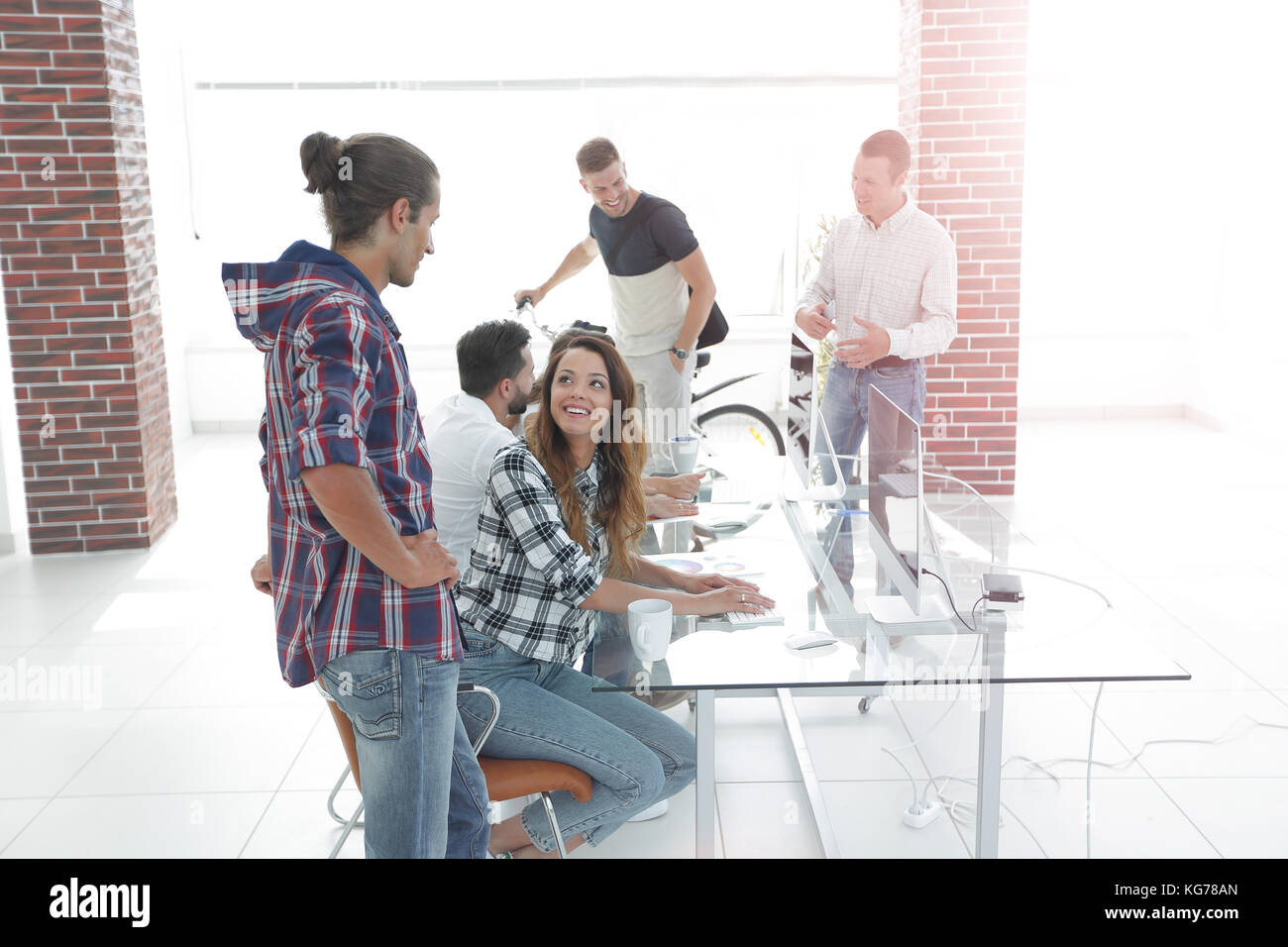 creative team working in a modern office Stock Photo - Alamy
