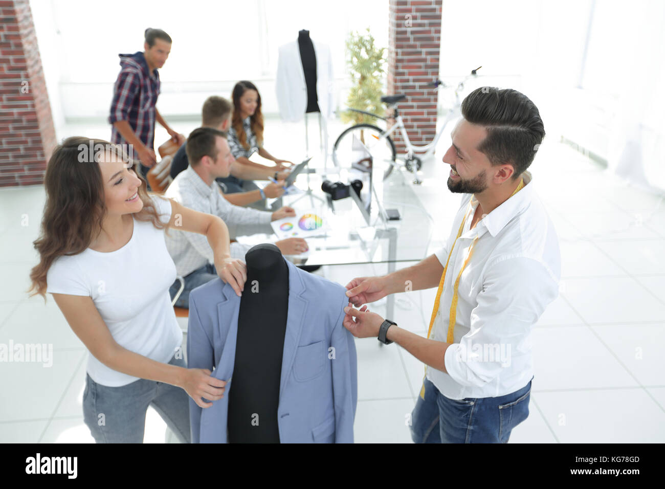 designers working on new models of clothes Stock Photo - Alamy