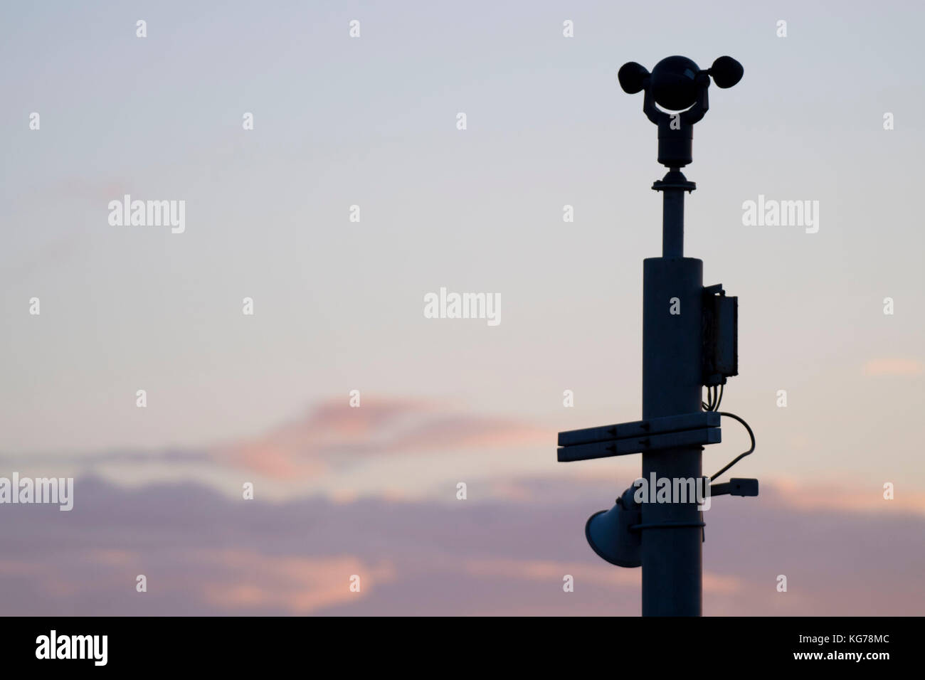 CCTV security cameras at sunset sunrise Stock Photo - Alamy