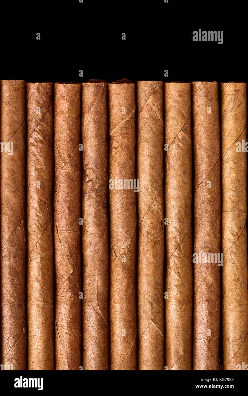 Cigars on black table, top view Stock Photo - Alamy