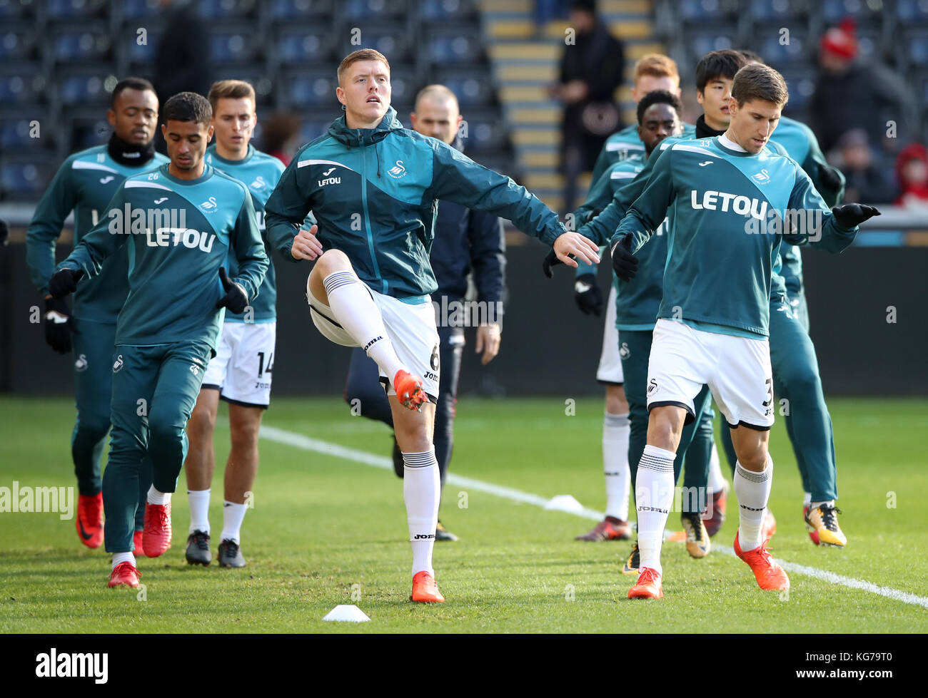 Swansea City's Alfie Mawson and Swansea City's Neil Taylor warm up ...