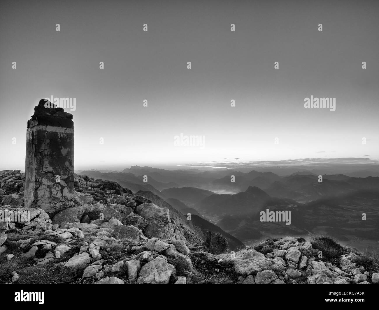 National border stone on Apine gravel cliff. Austria Germany border ...