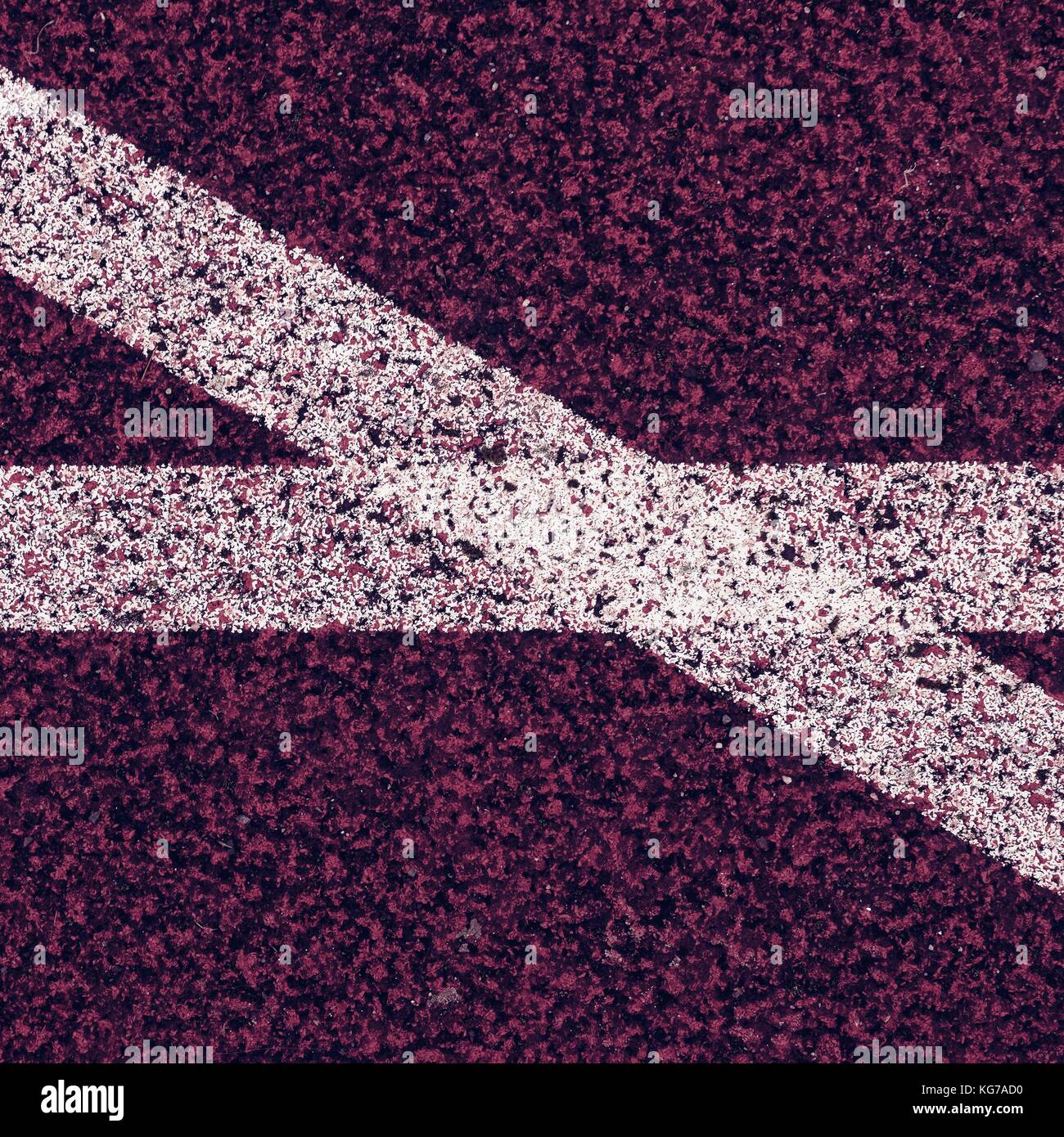 White lines and texture of running racetrack, red rubber racetracks in ...
