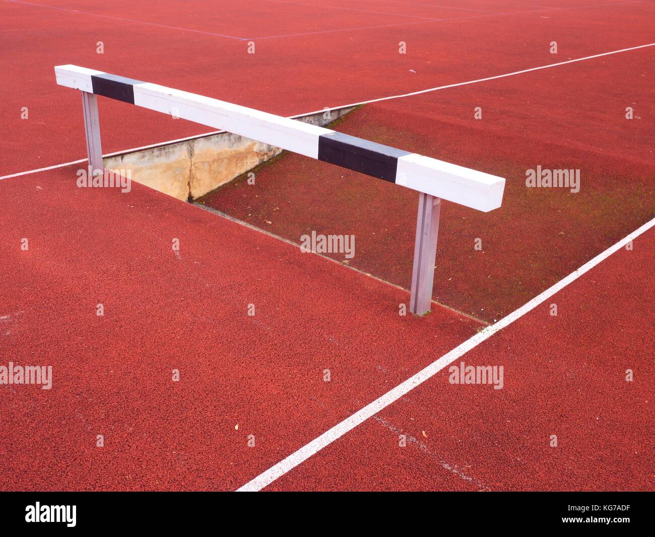 High hurdle. Hurdle track running lane. Wooden Hurdle On red High ... High hurdle. Hurdle track running lane. Wooden Hurdle On red High ...