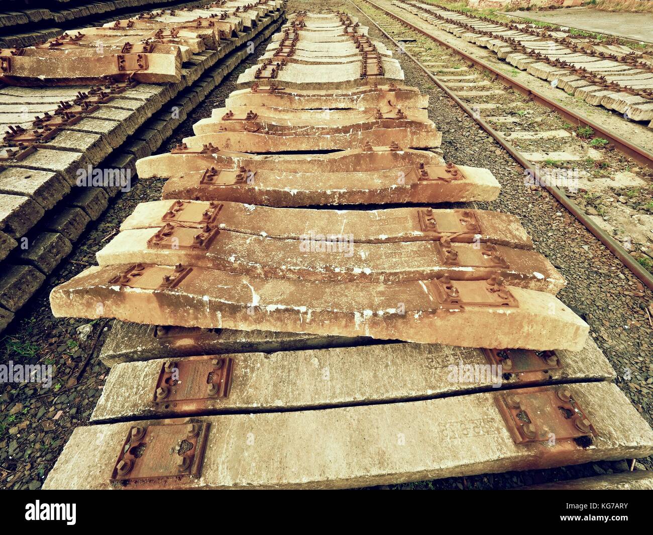 Extracted old concrete sleepers in stock. Old rusty used concrete ...