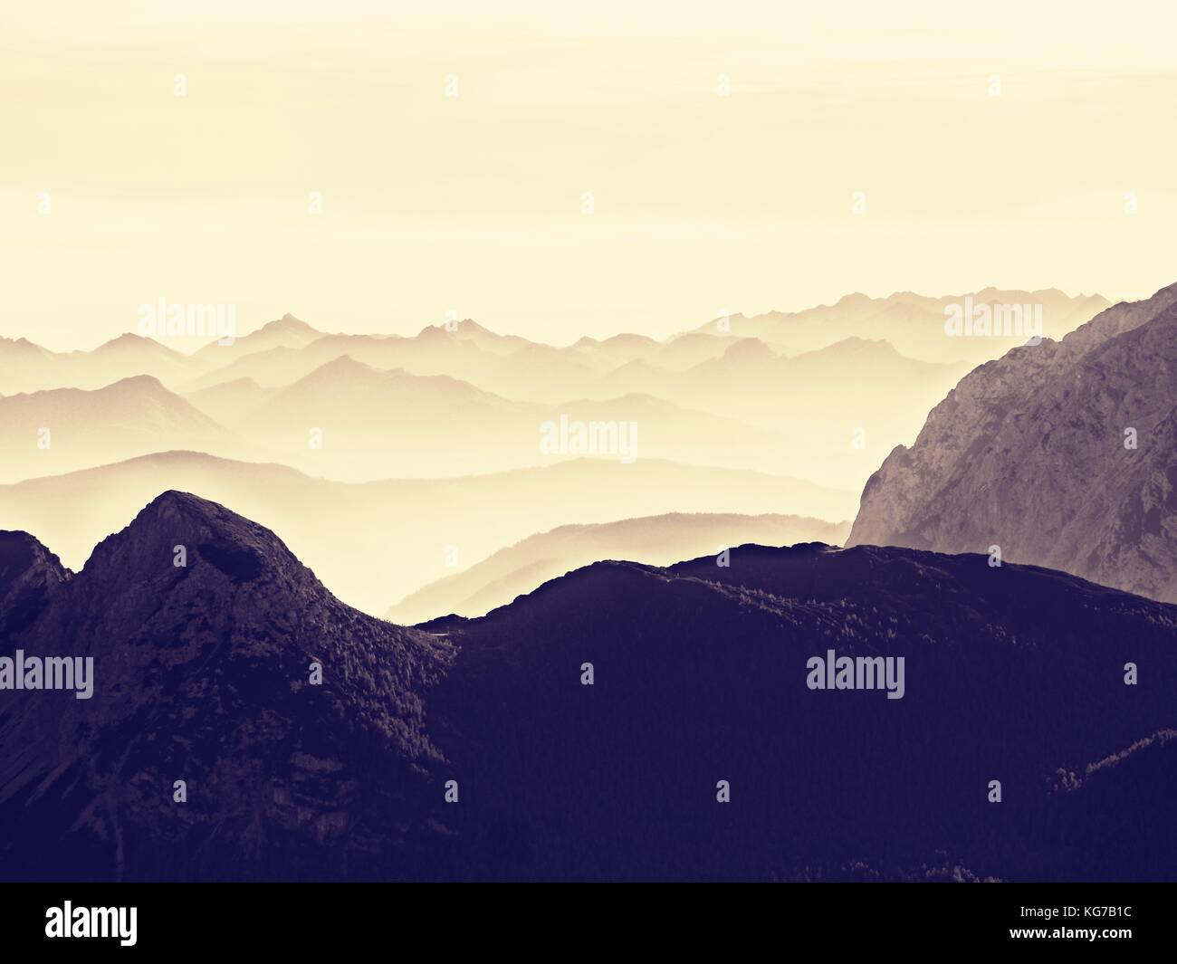 View over high sharp mountain peaks from plane, beautiful view ...