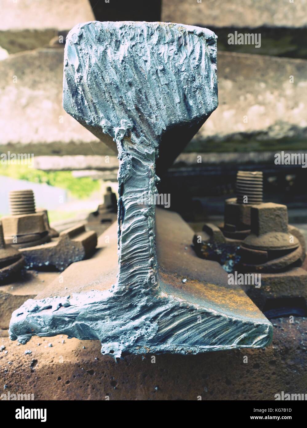 Detail of cut rail. Autogen torch cut rail rod on concrete sleeper ...