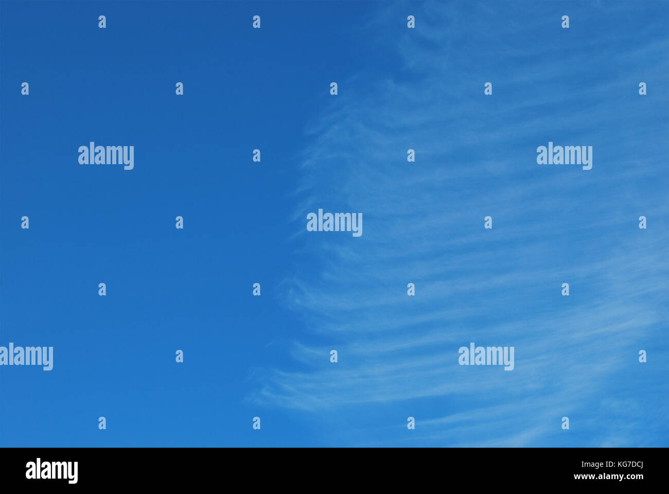 Unusual clouds with stripes against the blue sky Stock Photo - Alamy