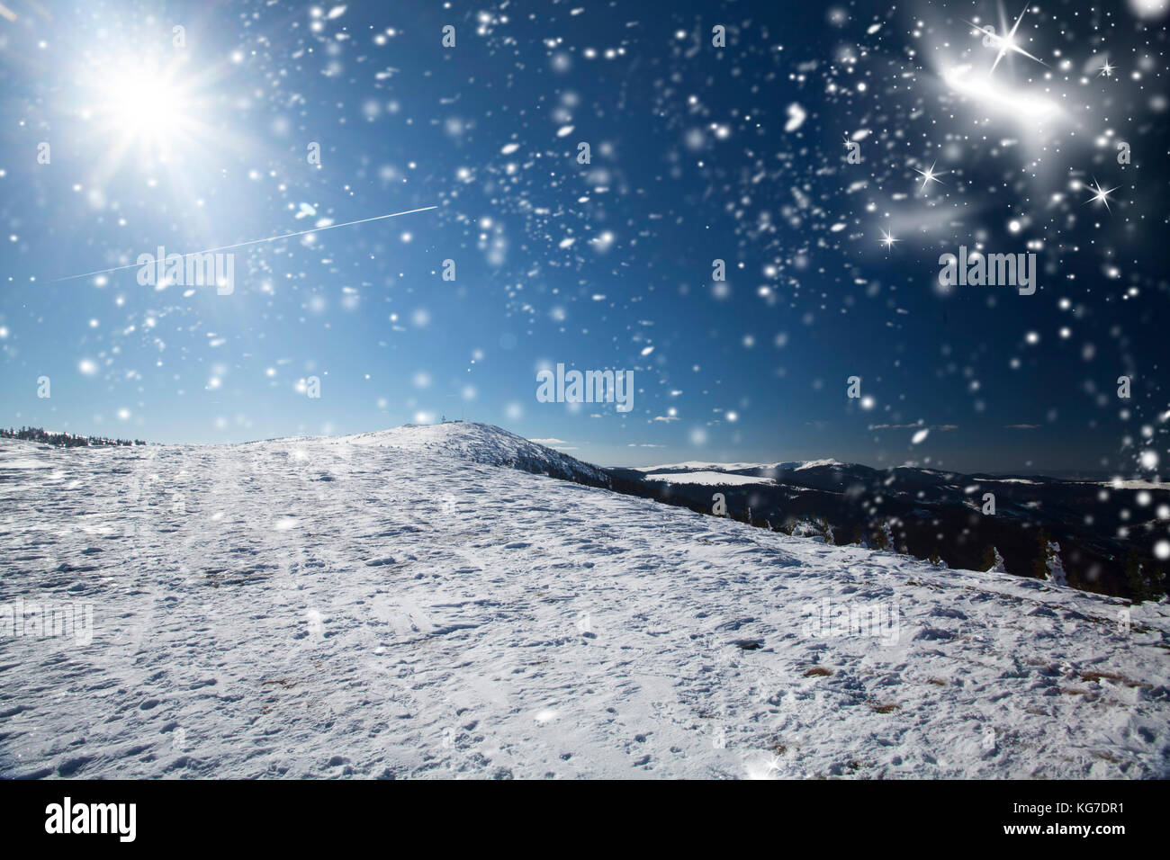 Snow covered hillside in the high mountains in bright sunshine Stock ...