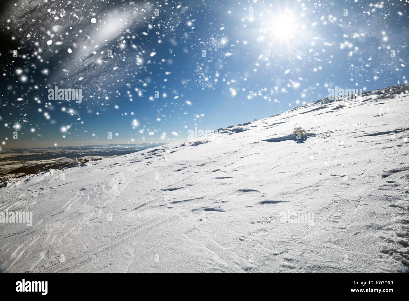 Snow covered hillside in the high mountains in bright sunshine Stock ...