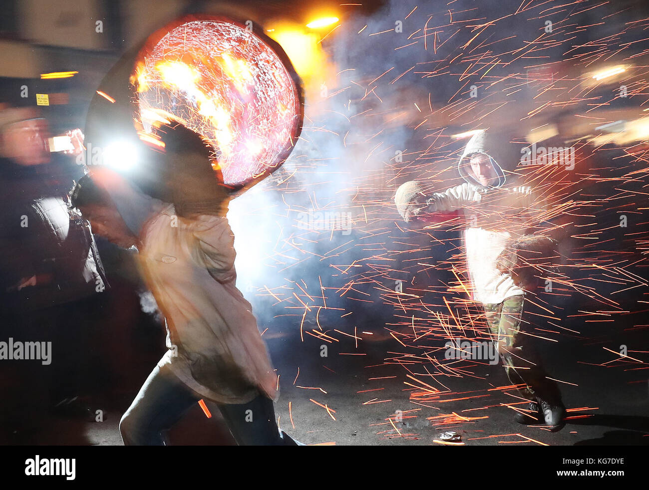 People from the Devonshire village of Ottery St Mary carry the ...