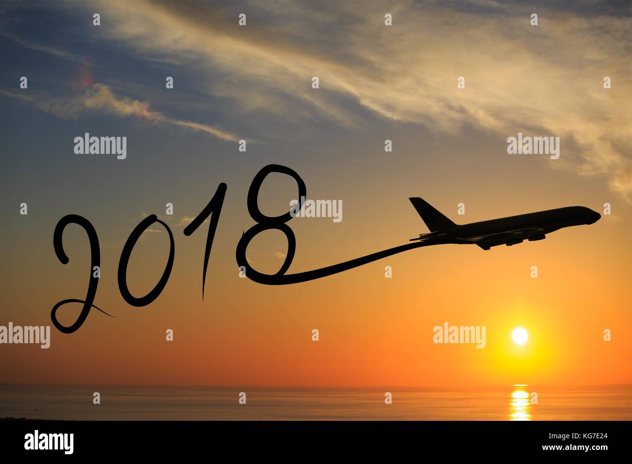 New year 2018 drawing by airplane on the air at sunset Stock Photo - Alamy