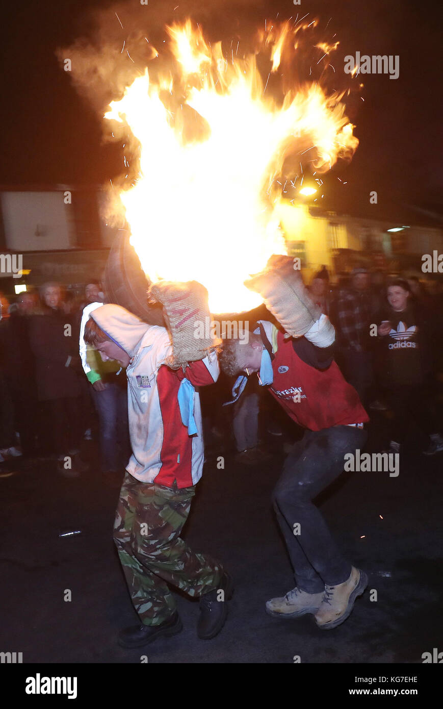 People from the Devonshire village of Ottery St Mary carry the ...