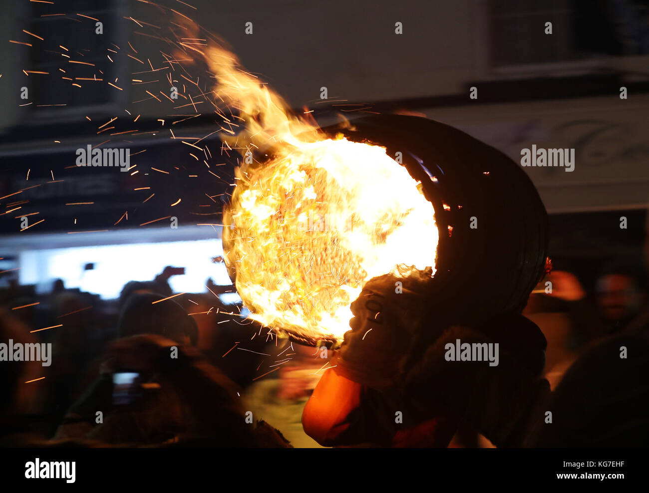 People from the Devonshire village of Ottery St Mary carry the ...