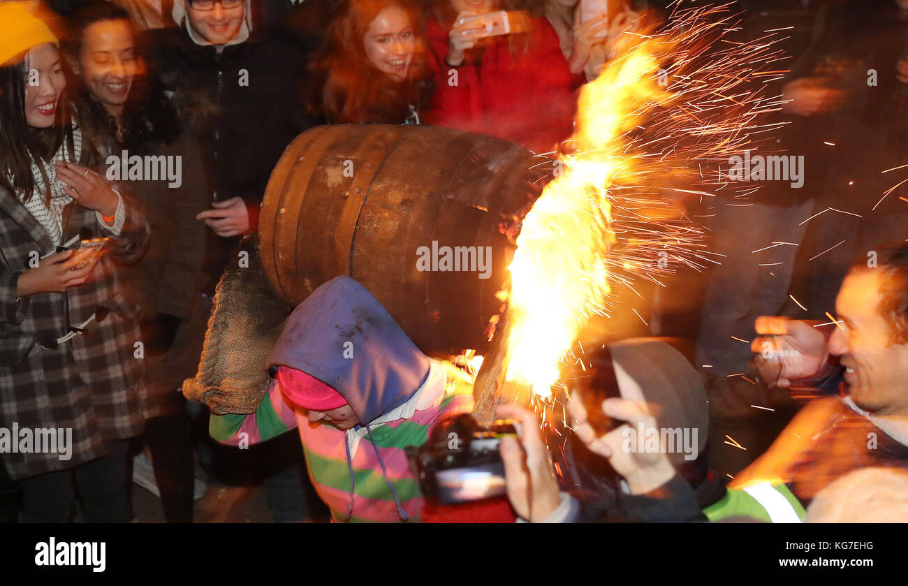 People from the Devonshire village of Ottery St Mary carry the ...