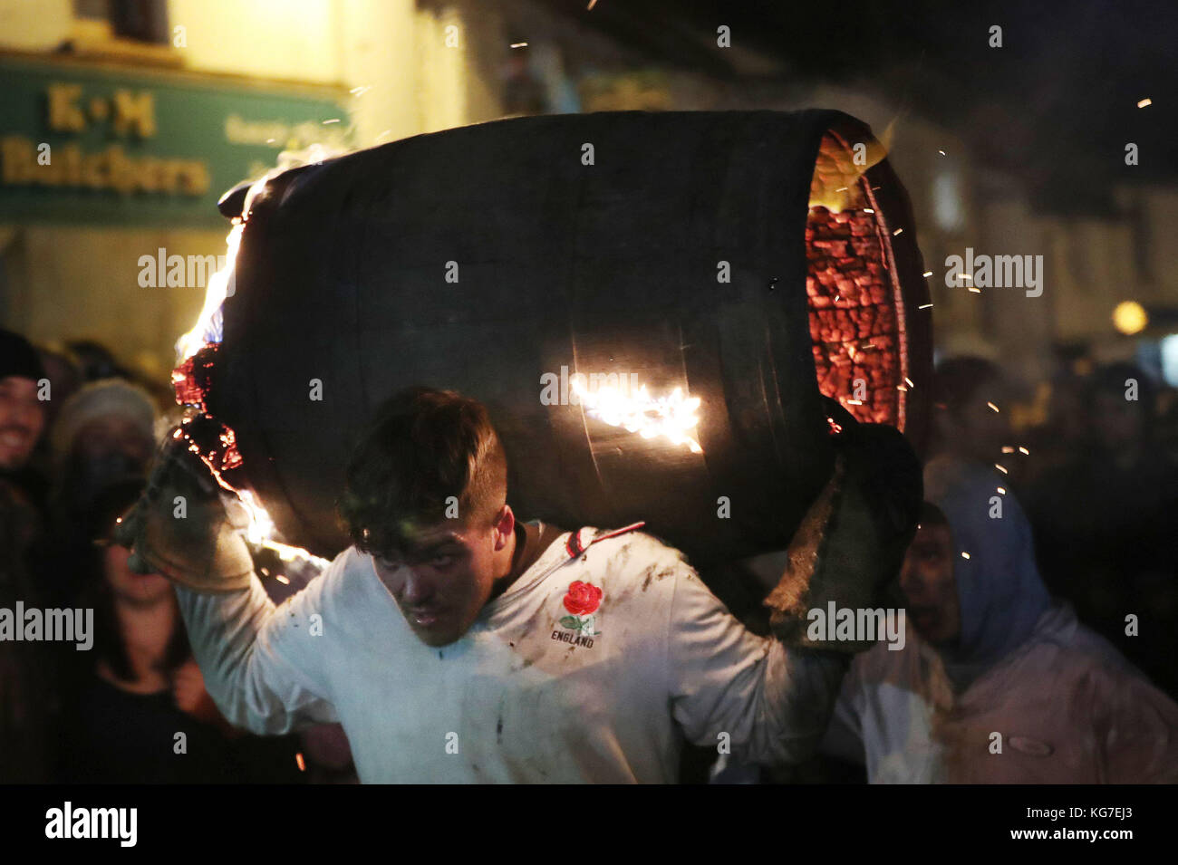 People from the Devonshire village of Ottery St Mary carry the ...