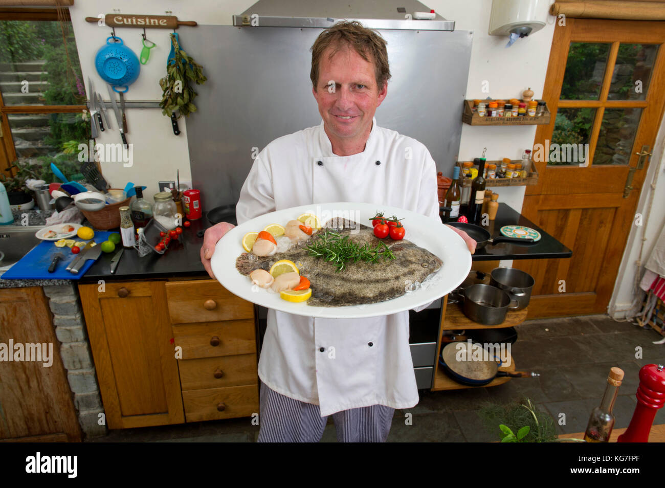 Chef William Marsden cooking with turbot & oysters in his kitchen in ...