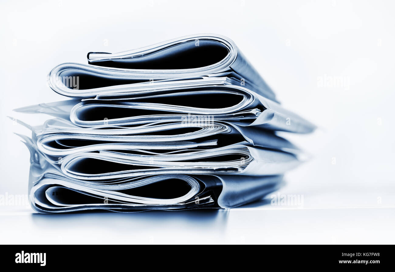 Stack of folded business, legal or insurance papers Stock Photo - Alamy