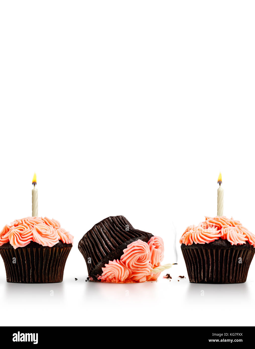 Smashed cupcake in row of cupcakes with candles isolated on white Stock ...