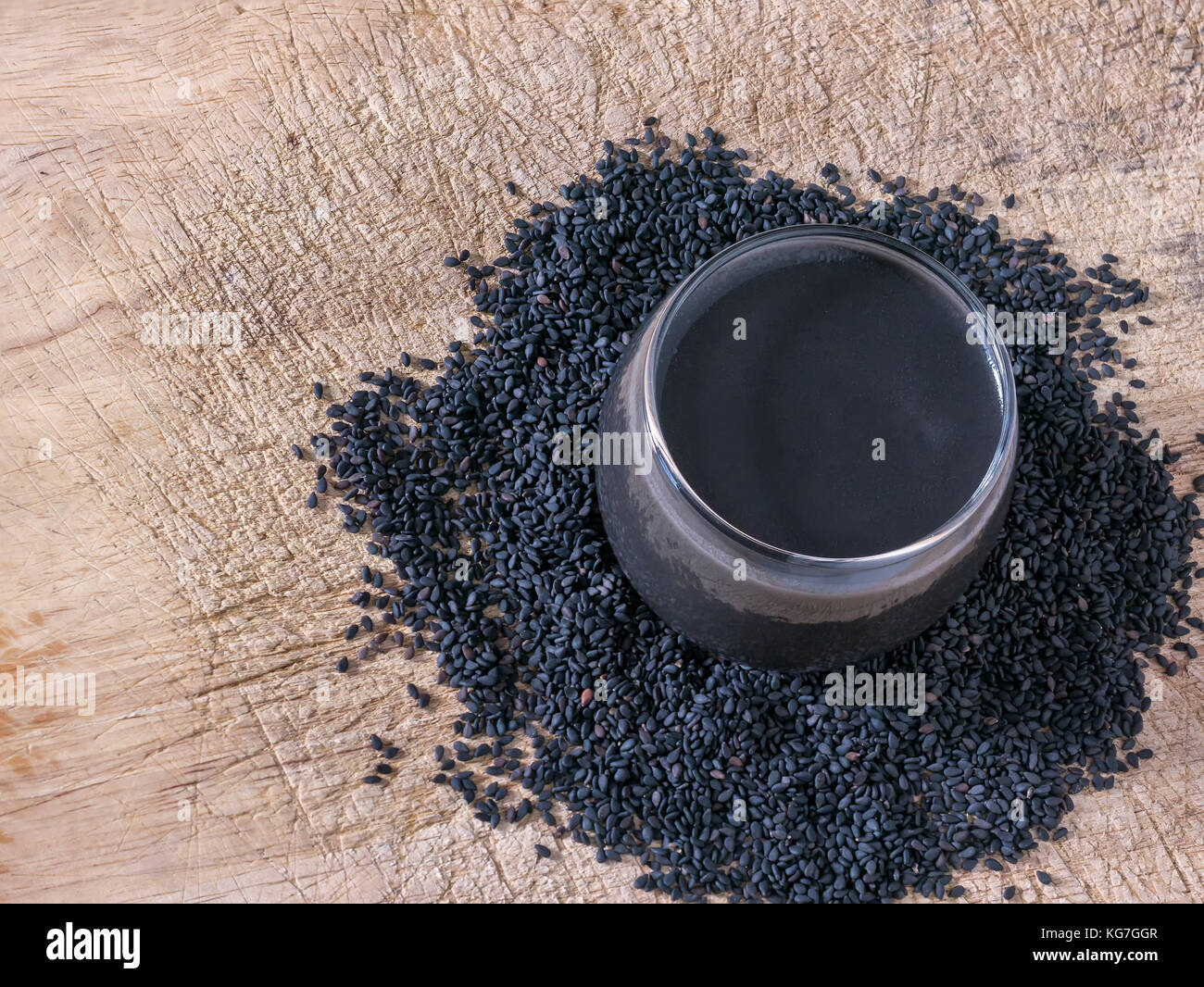 Sweet Delicious creamy black sesame drinking in cup with sesame seed on ...