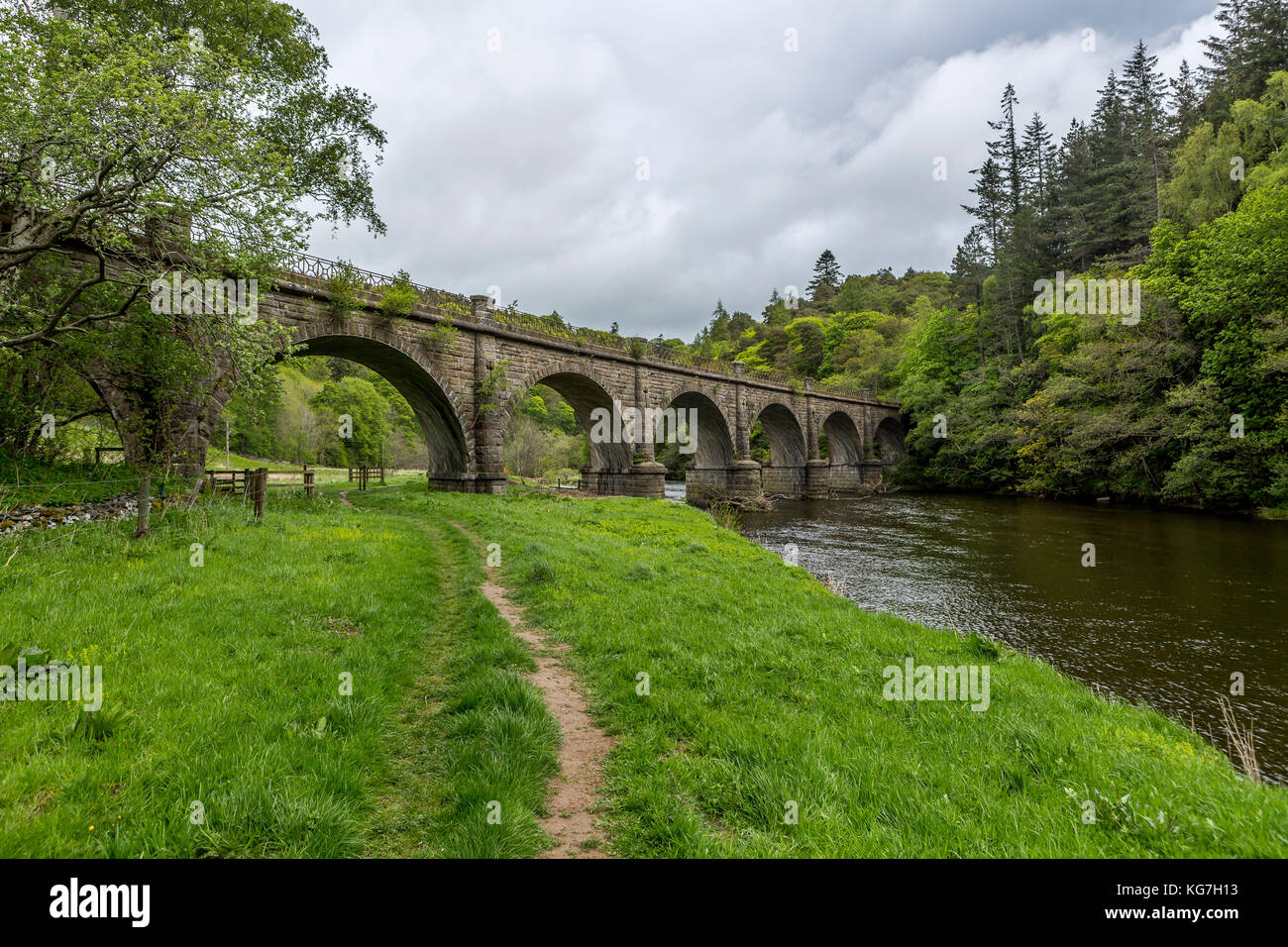Neidpath viaduct crosses the River Tweed just outside Peebles in the ...